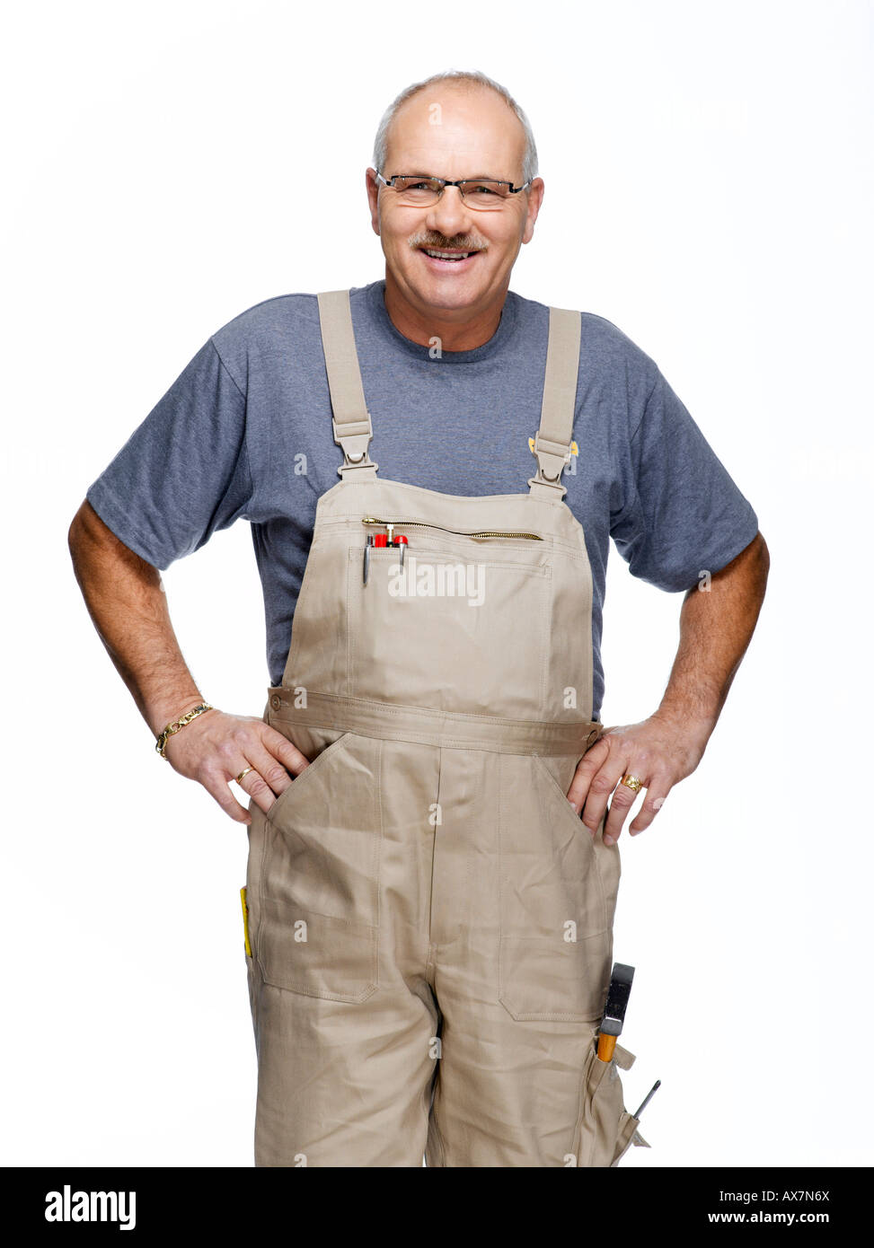 Craftsman in overall, portrait Stock Photo - Alamy