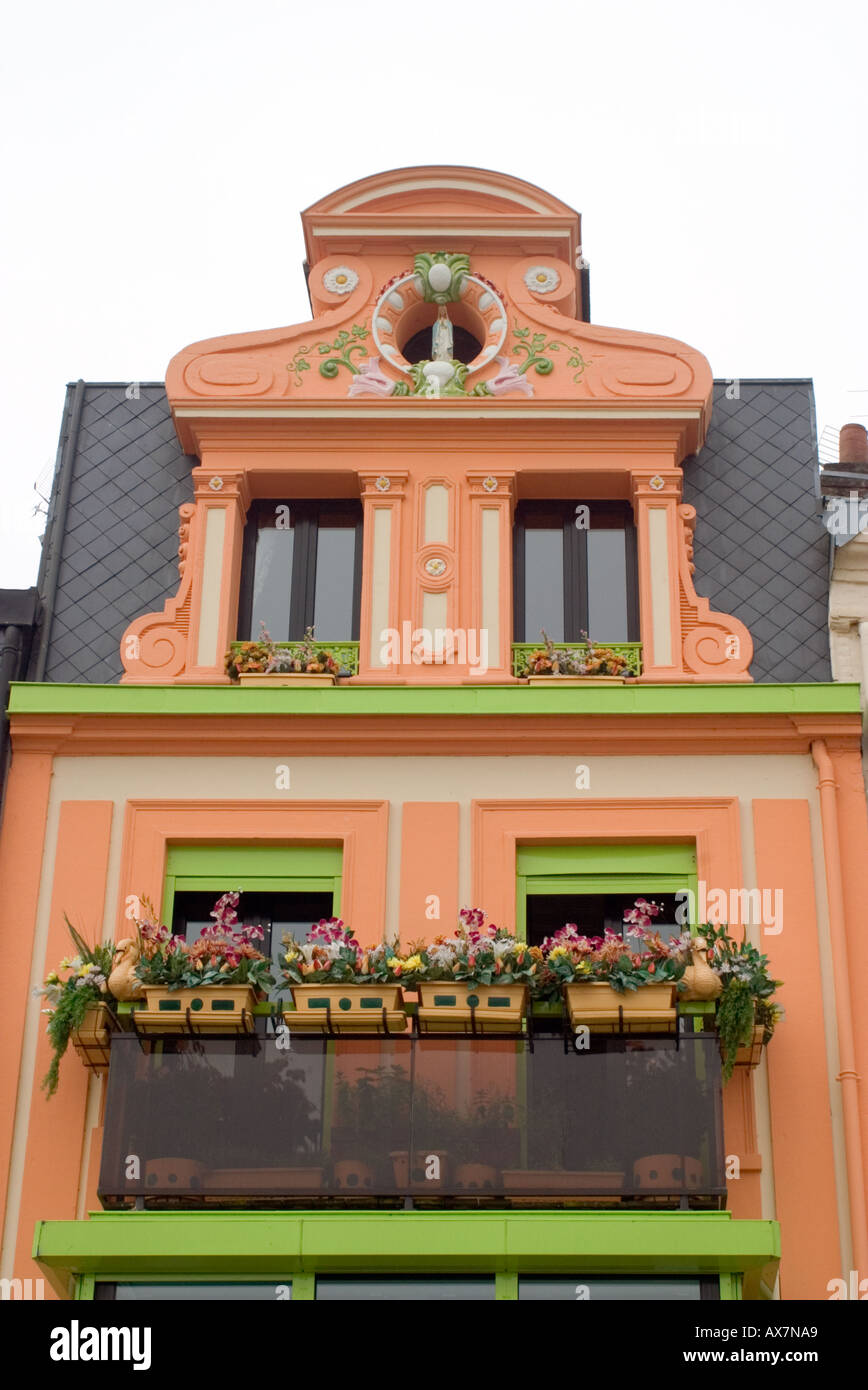 Facade of seafood restaurant painted orange and lime green on the ...