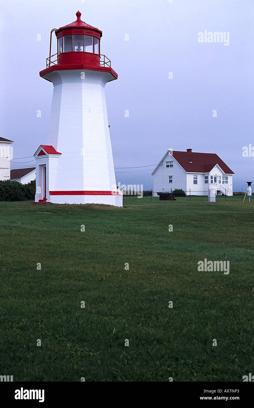 Lighthouse next to houses, Gaspesie, Quebec, Canada Stock Photo - Alamy