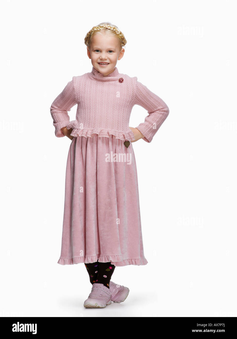 Blond girl (6-8) in a dress, portrait Stock Photo - Alamy