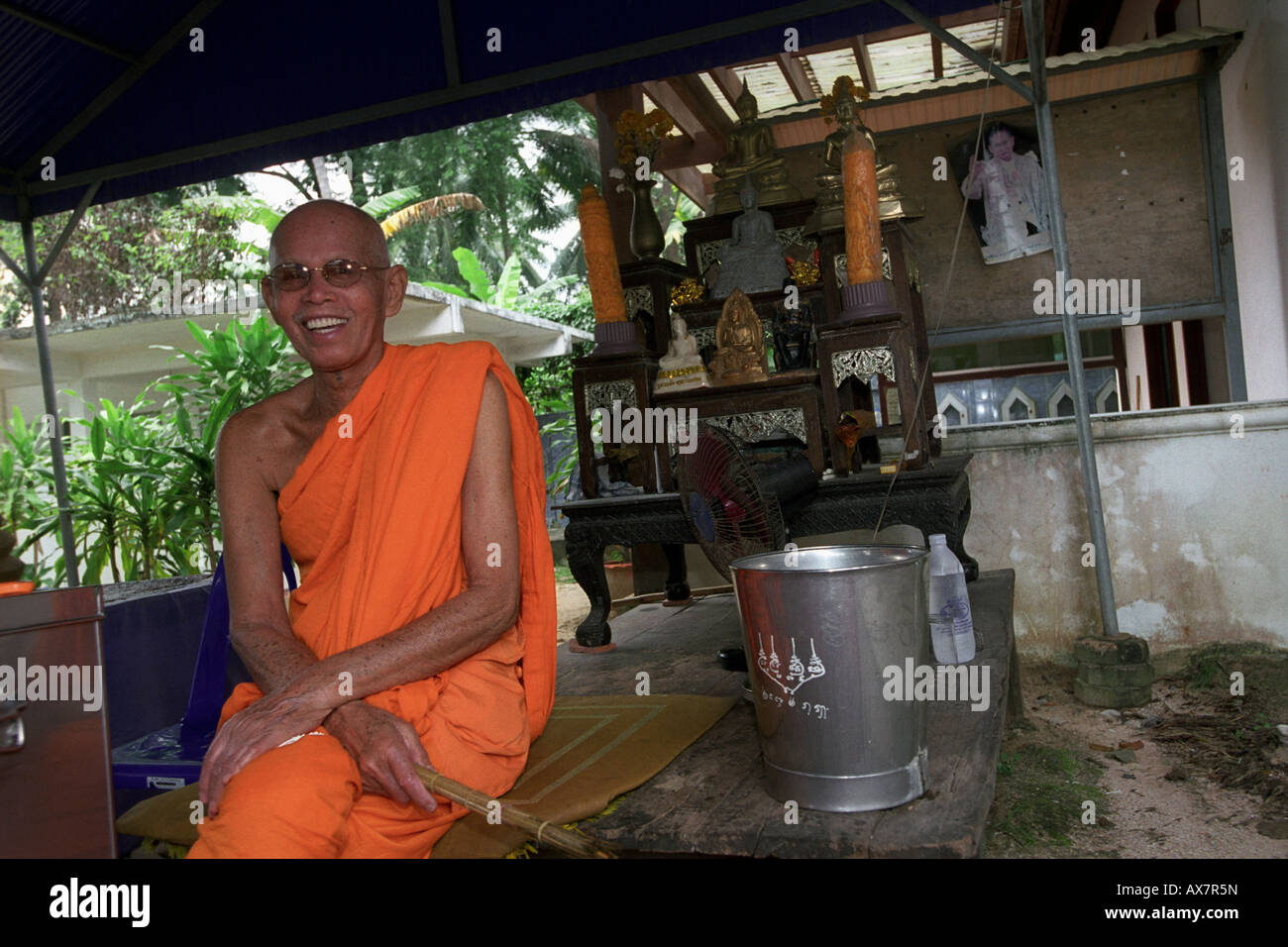 Buddhist monk, at Wat Khun Aram, Koh Samui, Thailand. Photographed out ...