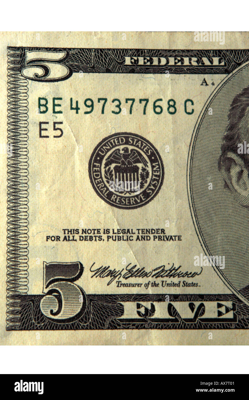 The Inscription on the left side of an American Five Dollar bill Stock ...