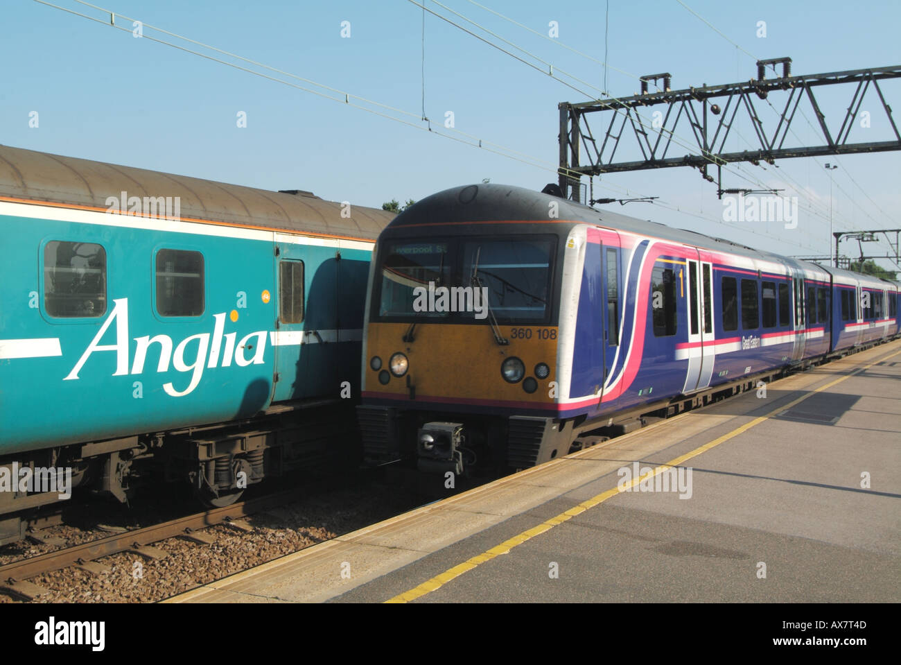 Train station platform One Great Eastern passenger train bound for ...