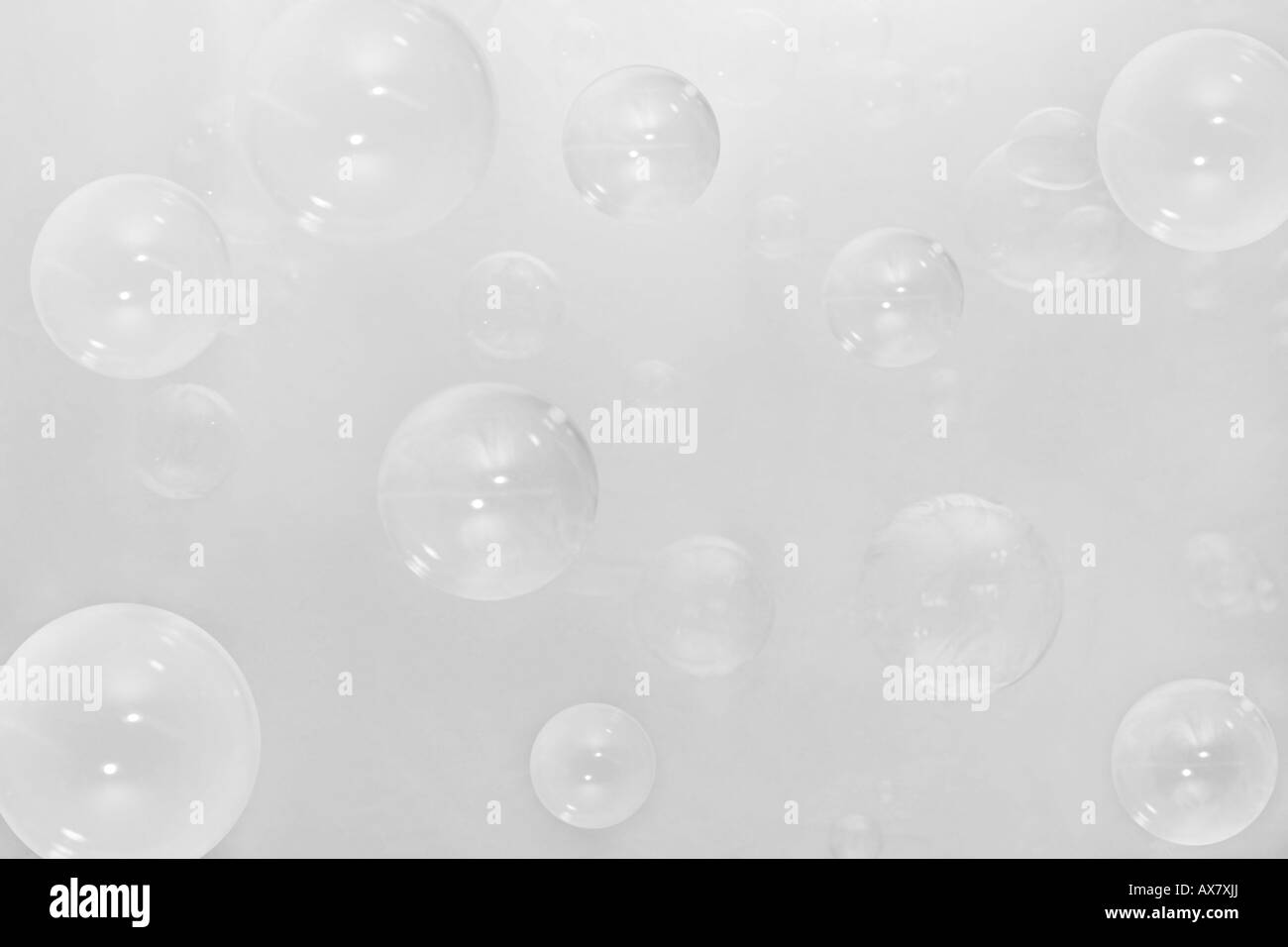 Bubbles floating through the air Stock Photo - Alamy
