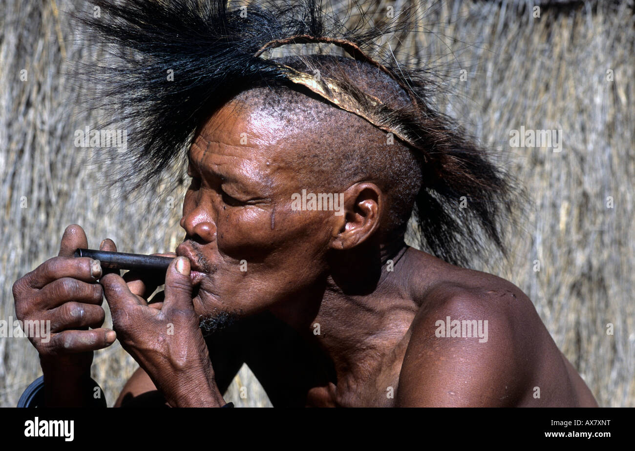 San Bushman portraiture man smoking Otjozondjupa Region Namibia Stock ...