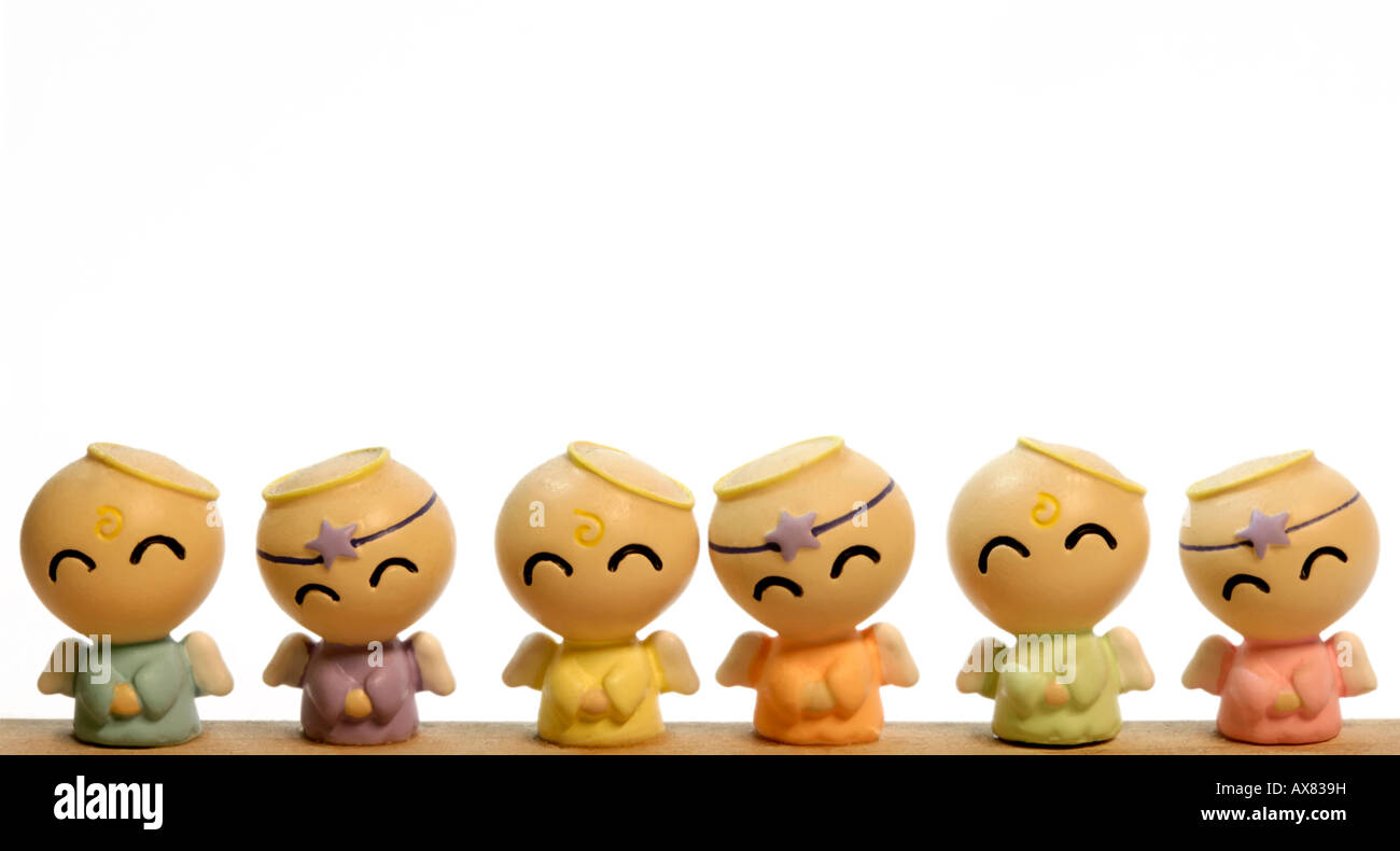 a row angel toys Stock Photo - Alamy