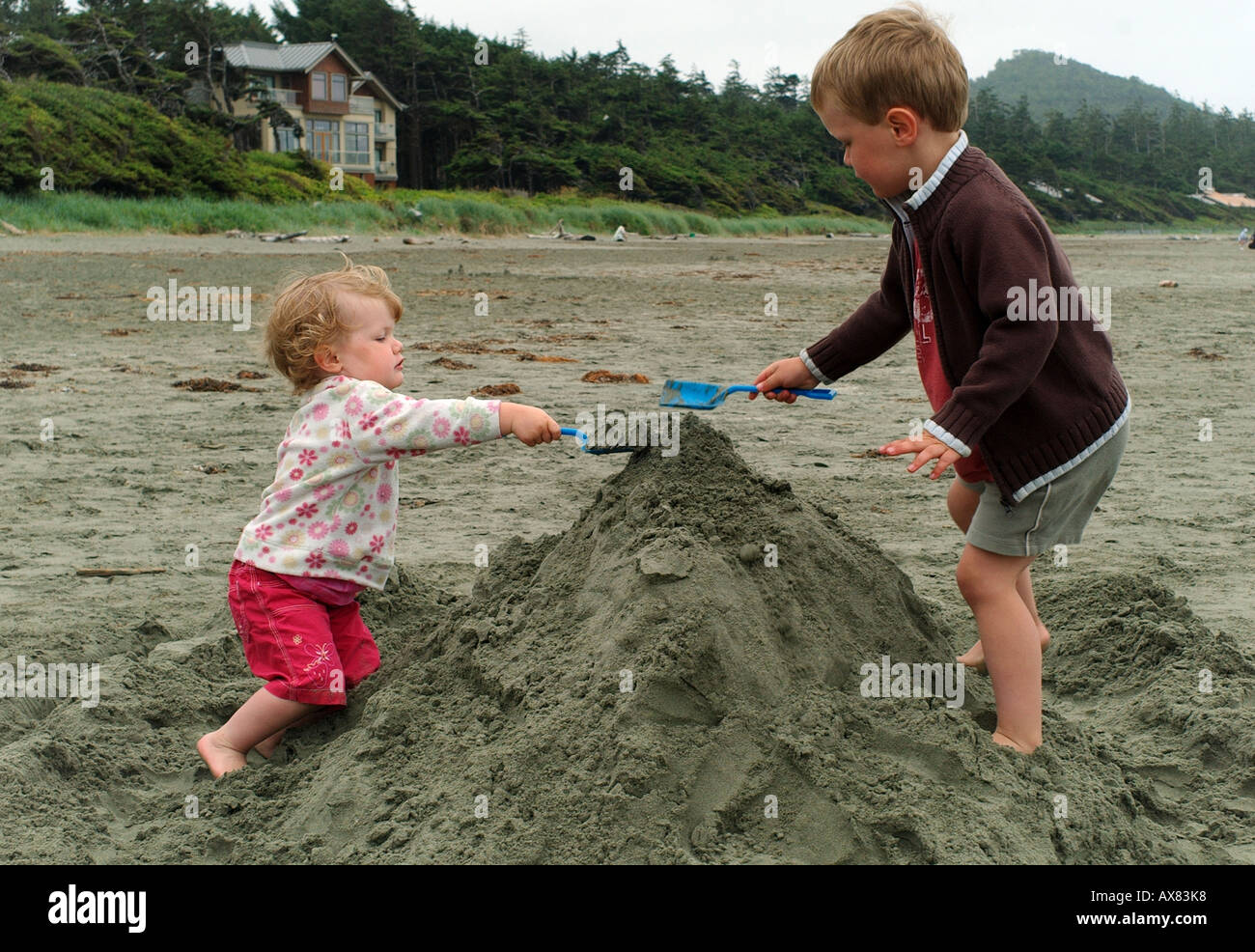 Making a sand castle Stock Photo - Alamy