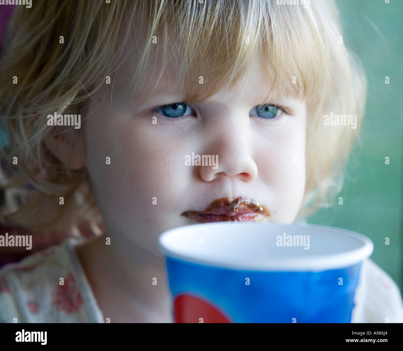 Girl after eating chocolate hi-res stock photography and images - Alamy