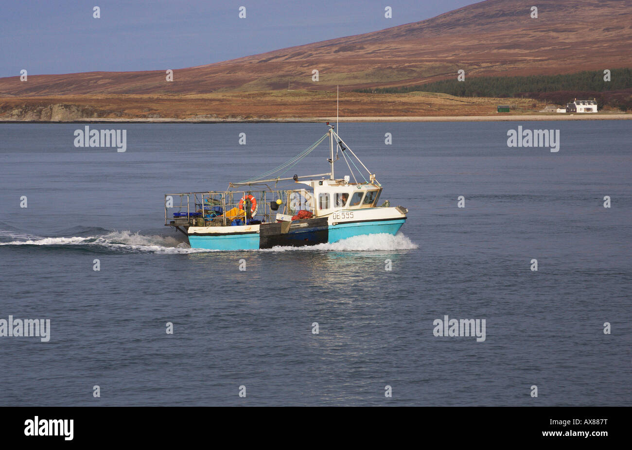 Fishing boat sailing in Sound of Jura off Isle of Islay Scotland Stock ...