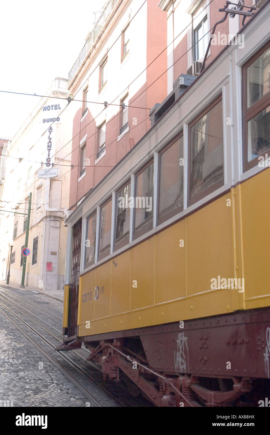 A yellow elevator tram in lisbon portugal Stock Photo - Alamy