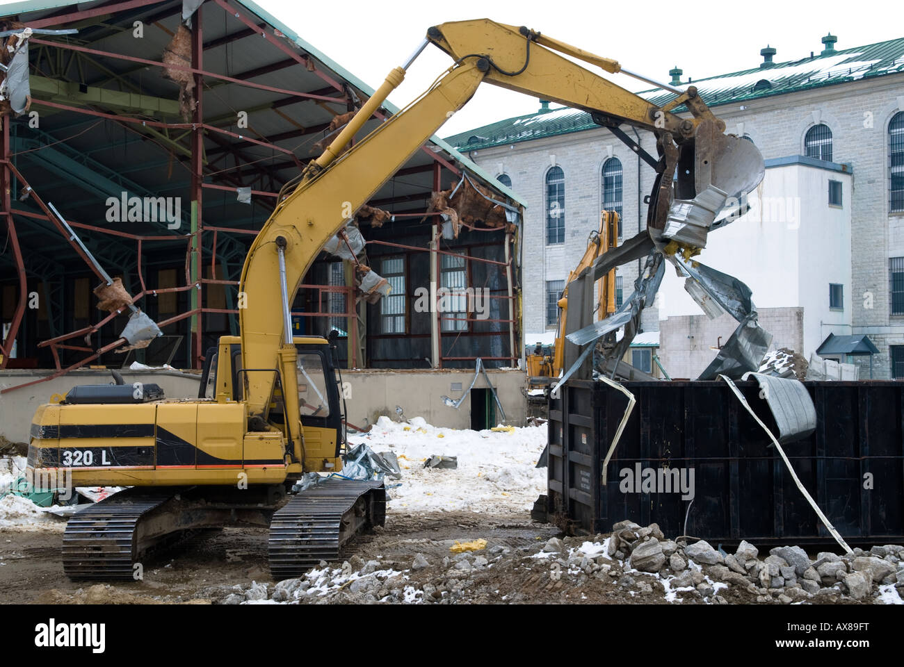 Demolition machines tear apart sections of the Womens Penitentiary in ...