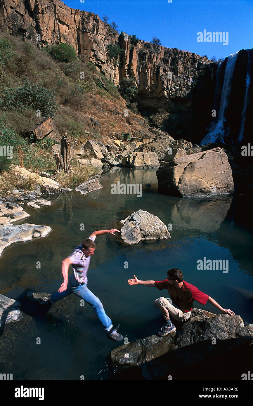Crossing a River, Helping Hand, Waterfall South Africa Stock Photo - Alamy