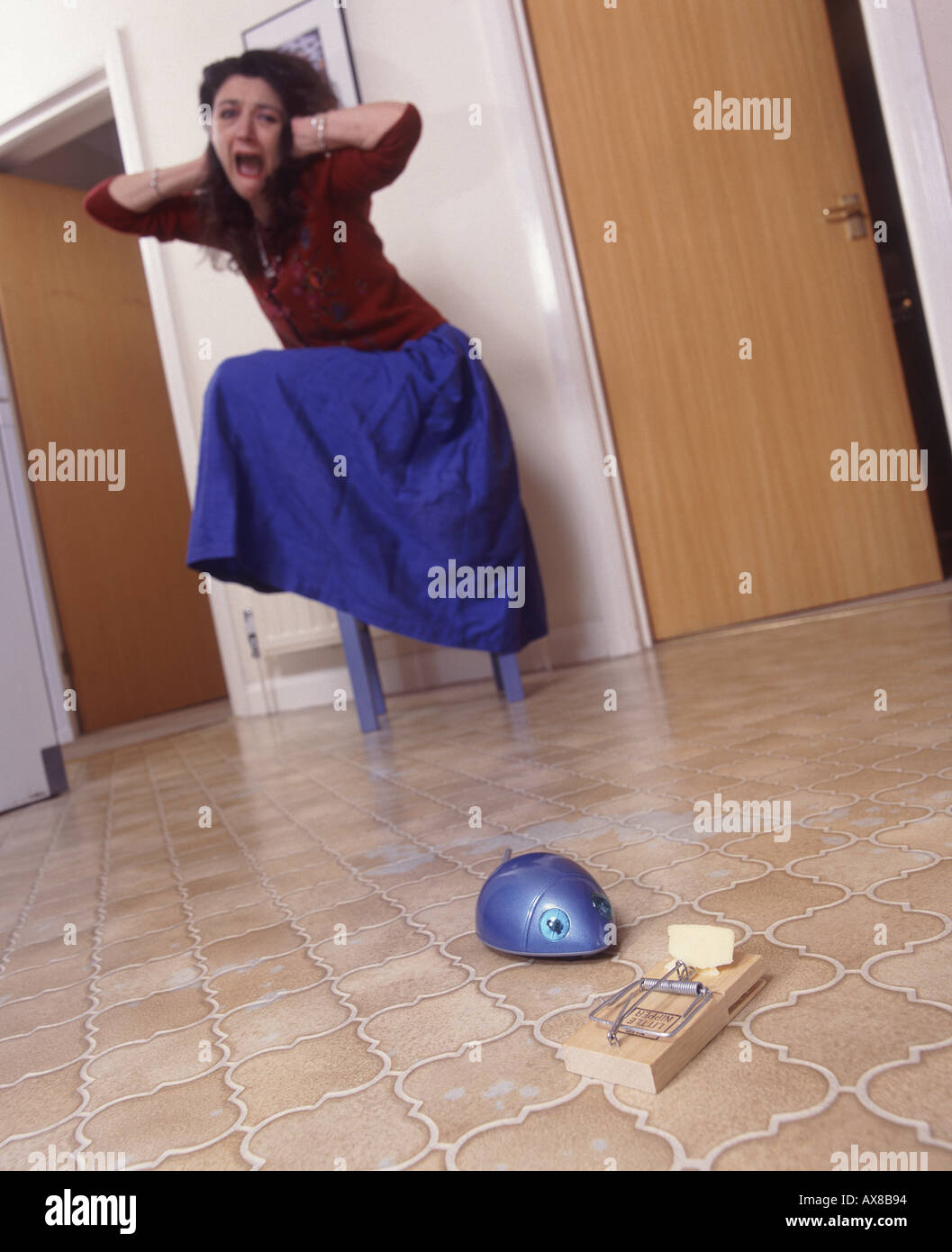 Woman scared mouse hi-res stock photography and images - Alamy