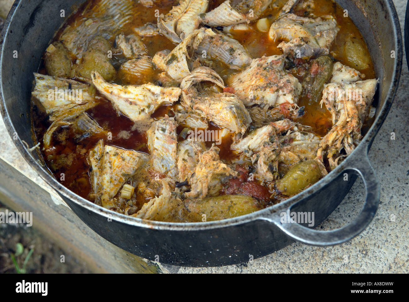 ray fish stew (court bouillon) cooked on open fire barbecue, creole ...