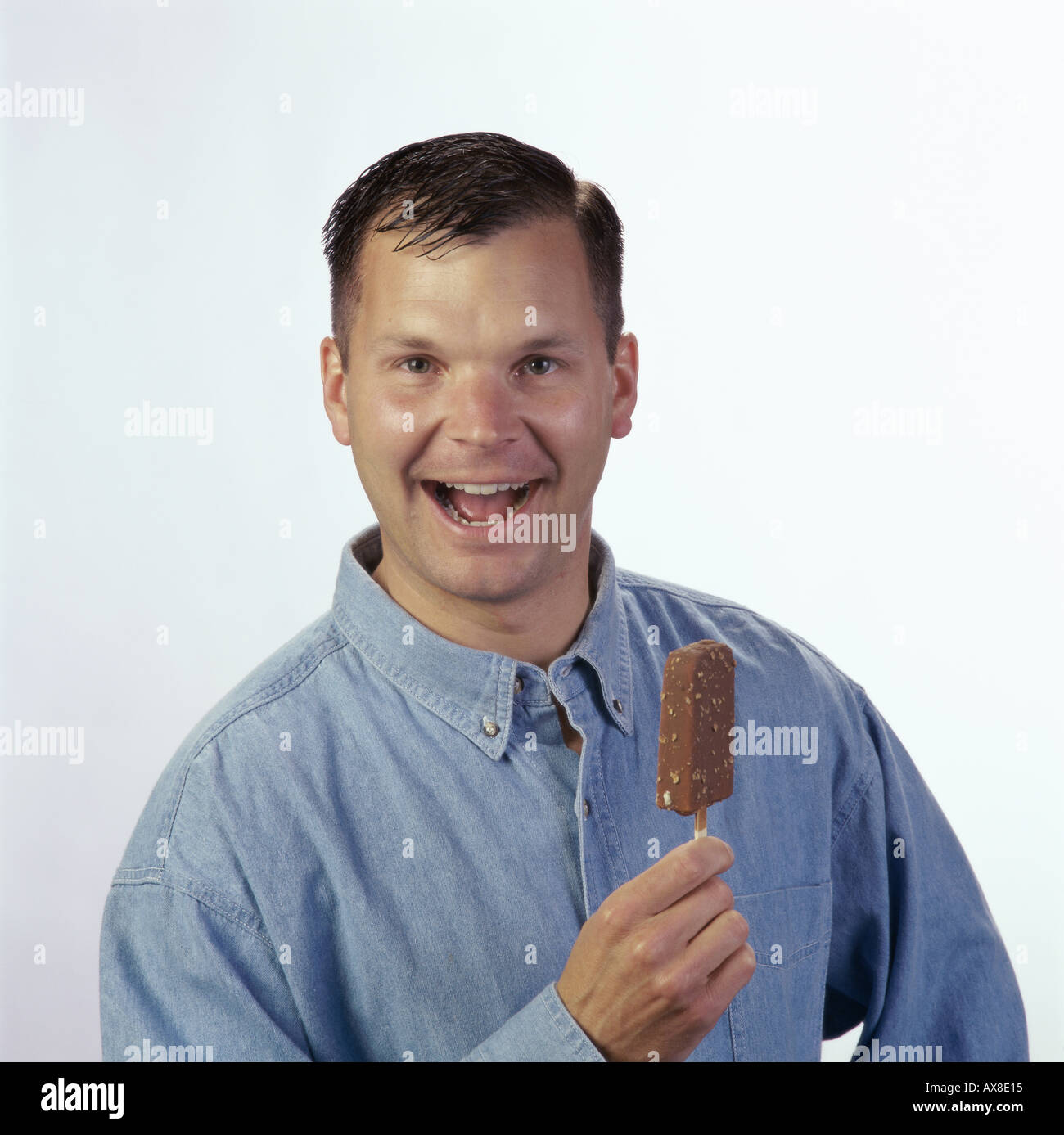 Man eating popsicle not child not woman hi-res stock photography and ...