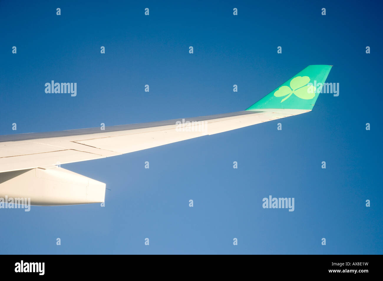 Aer Lingus commercial jet airliner wing in flight Stock Photo - Alamy