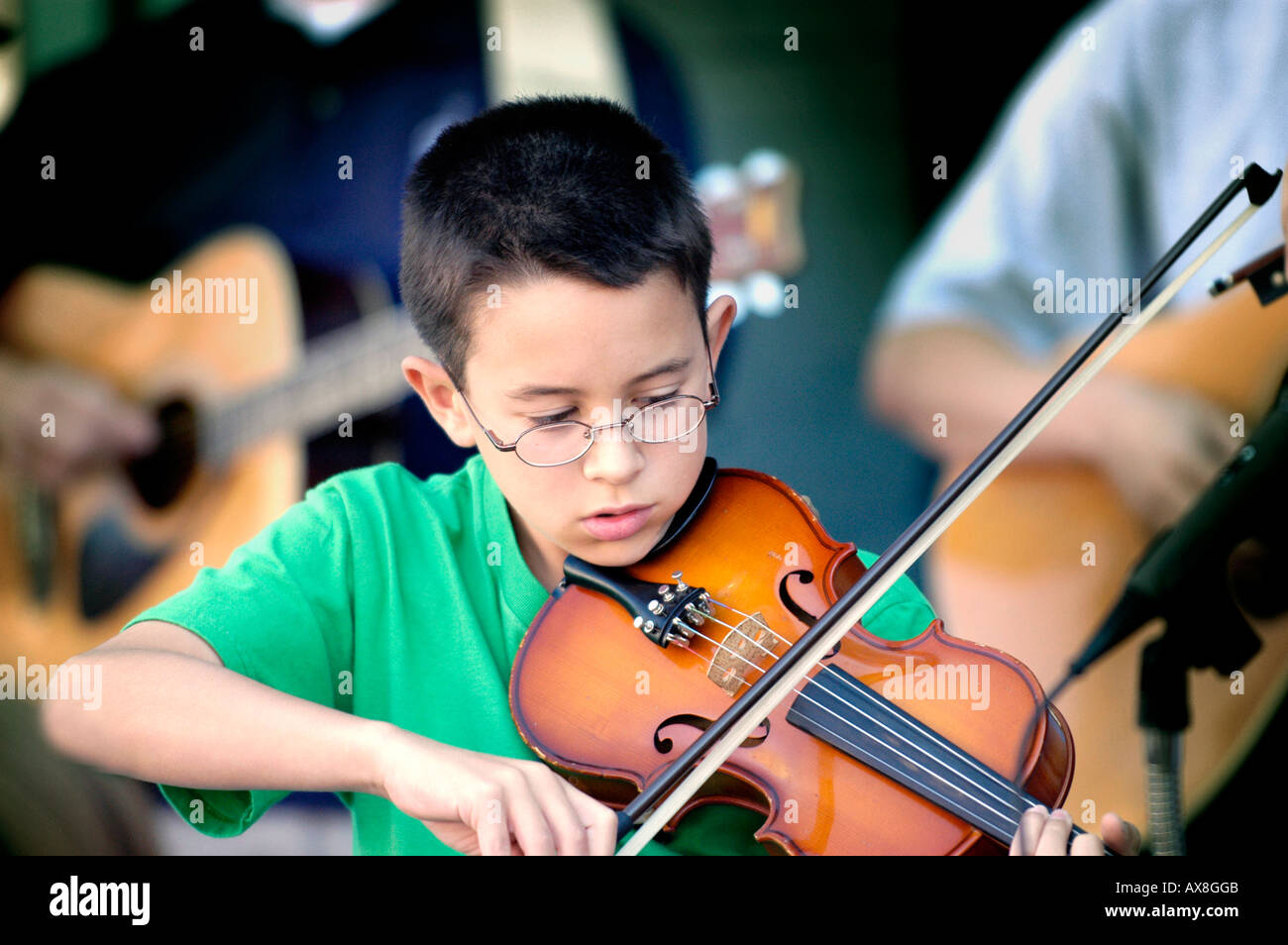 Child violin recital hi-res stock photography and images - Alamy