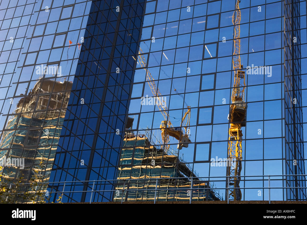 reflection of building construction in the Docklands area of London ...