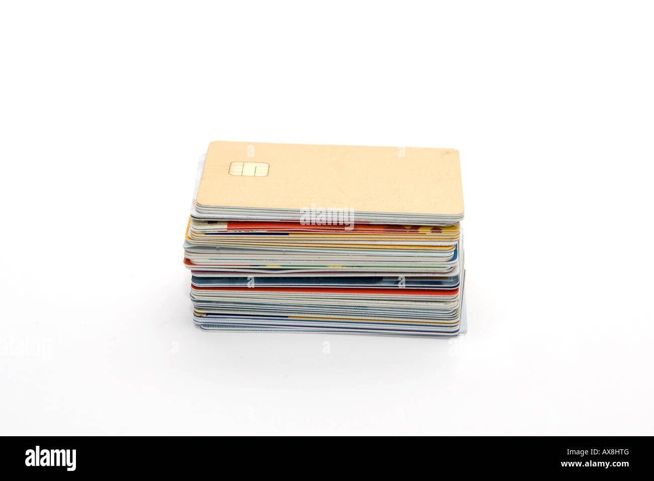 Credit card on a stack with white background Stock Photo - Alamy