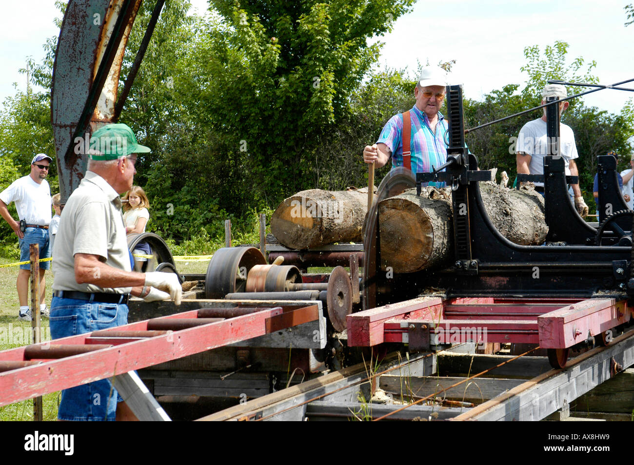 Demonstration of Steam powered log cutting saw as it was done circa ...