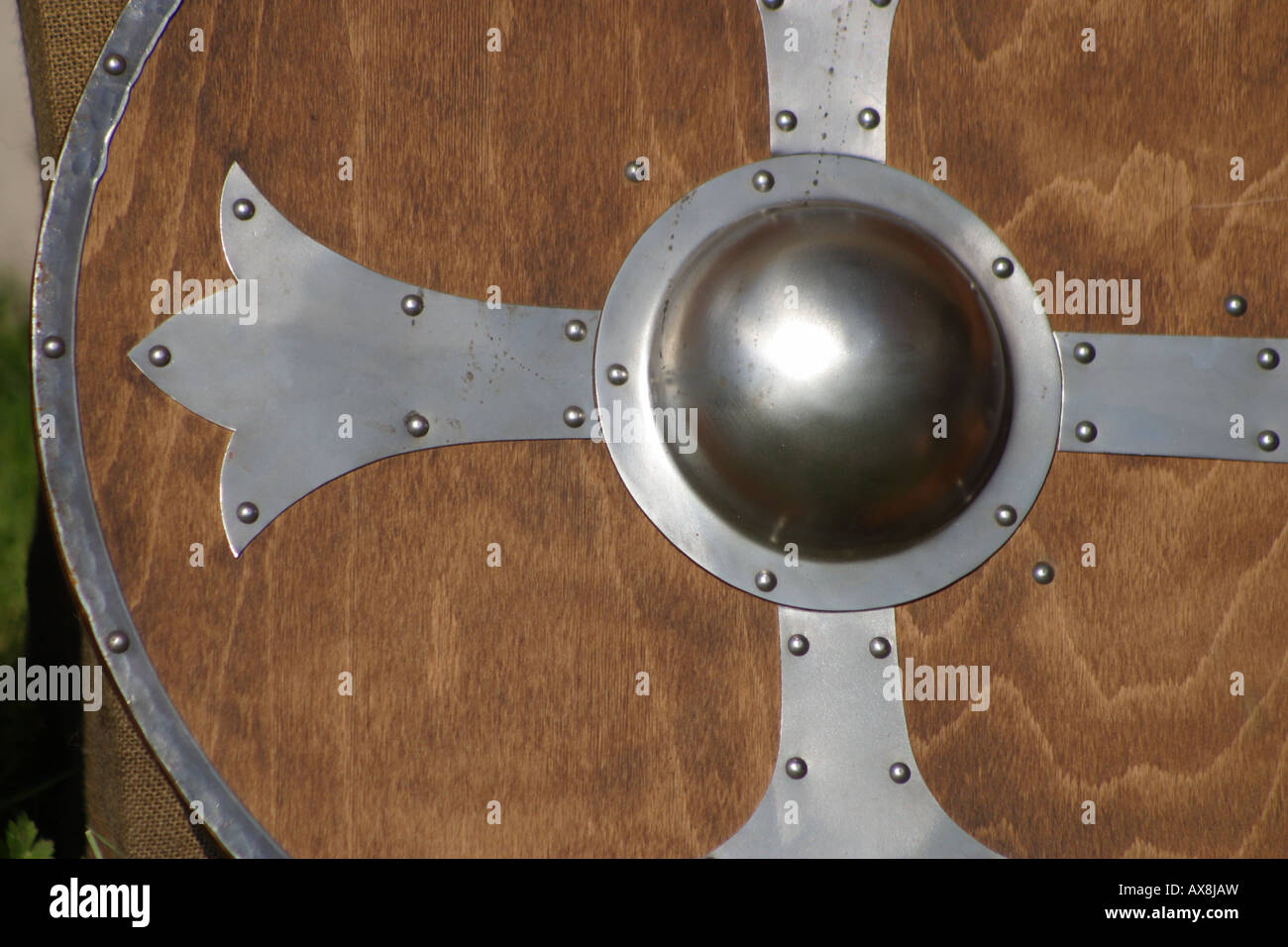 norman style shield with silver christian cross Stock Photo - Alamy