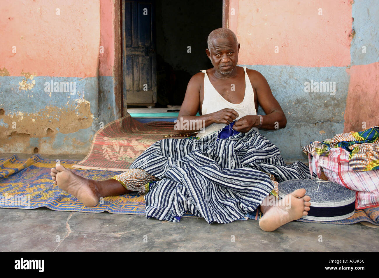 Making smocks from woven strips of material, in the Upper Eastern ...