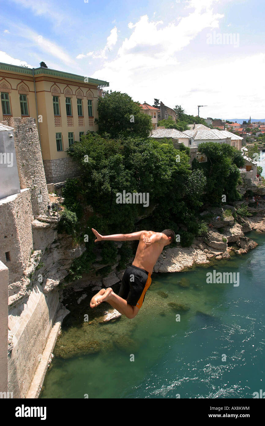 Traditional cliff diving jumps in Mostar Stock Photo - Alamy