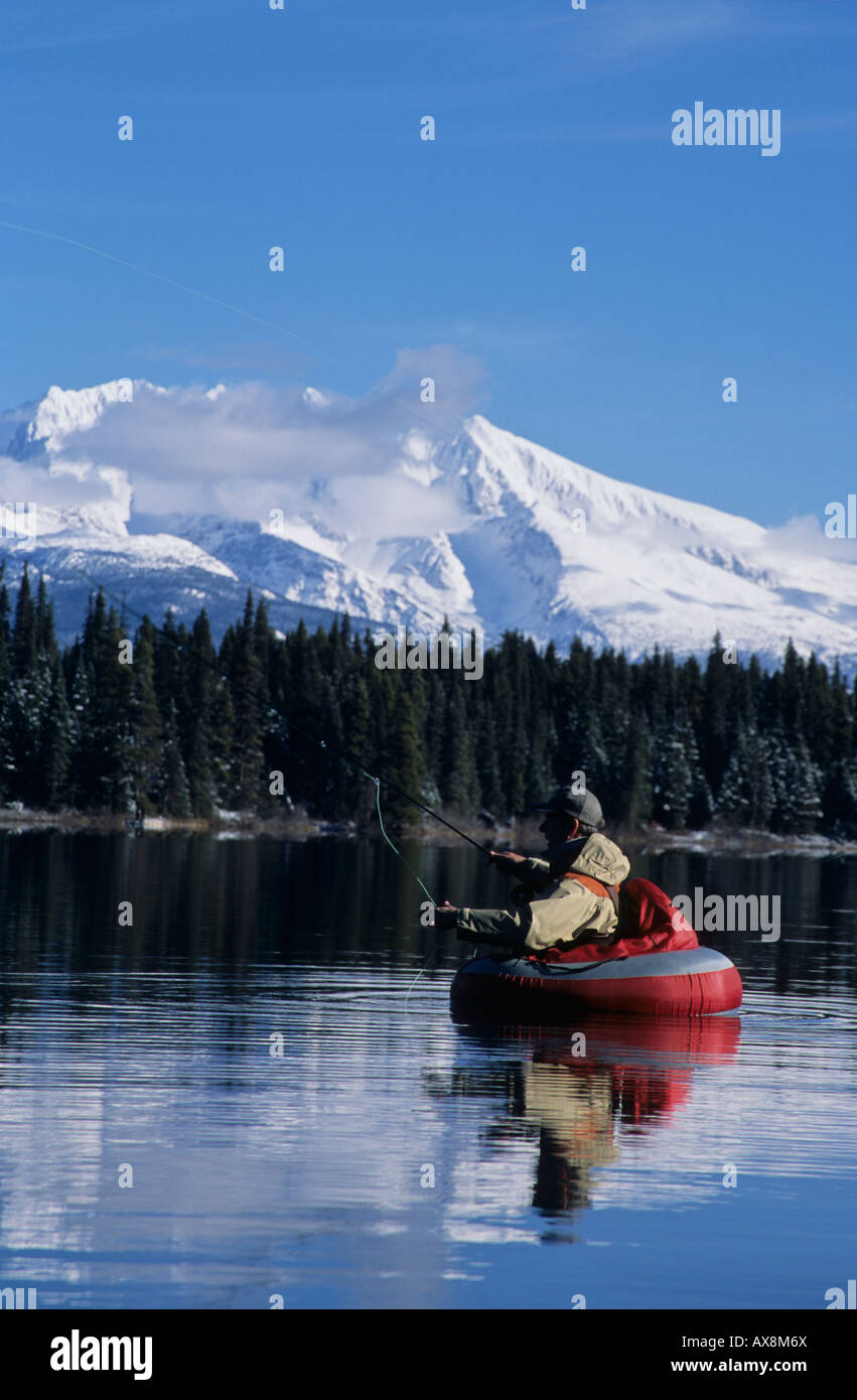 Flyfishing from float tube British Columbia Stock Photo - Alamy