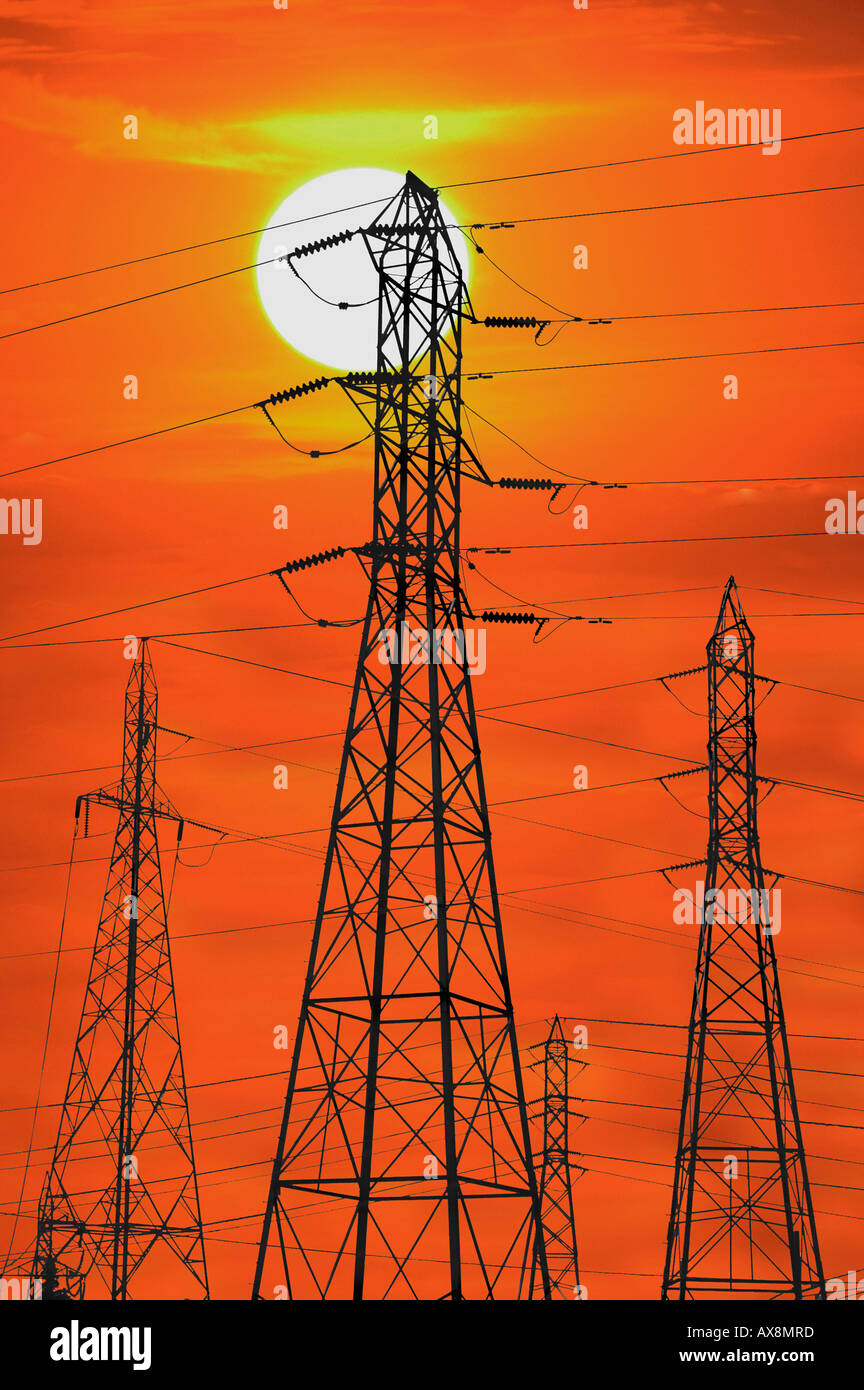 Power lines at sunset Stock Photo - Alamy