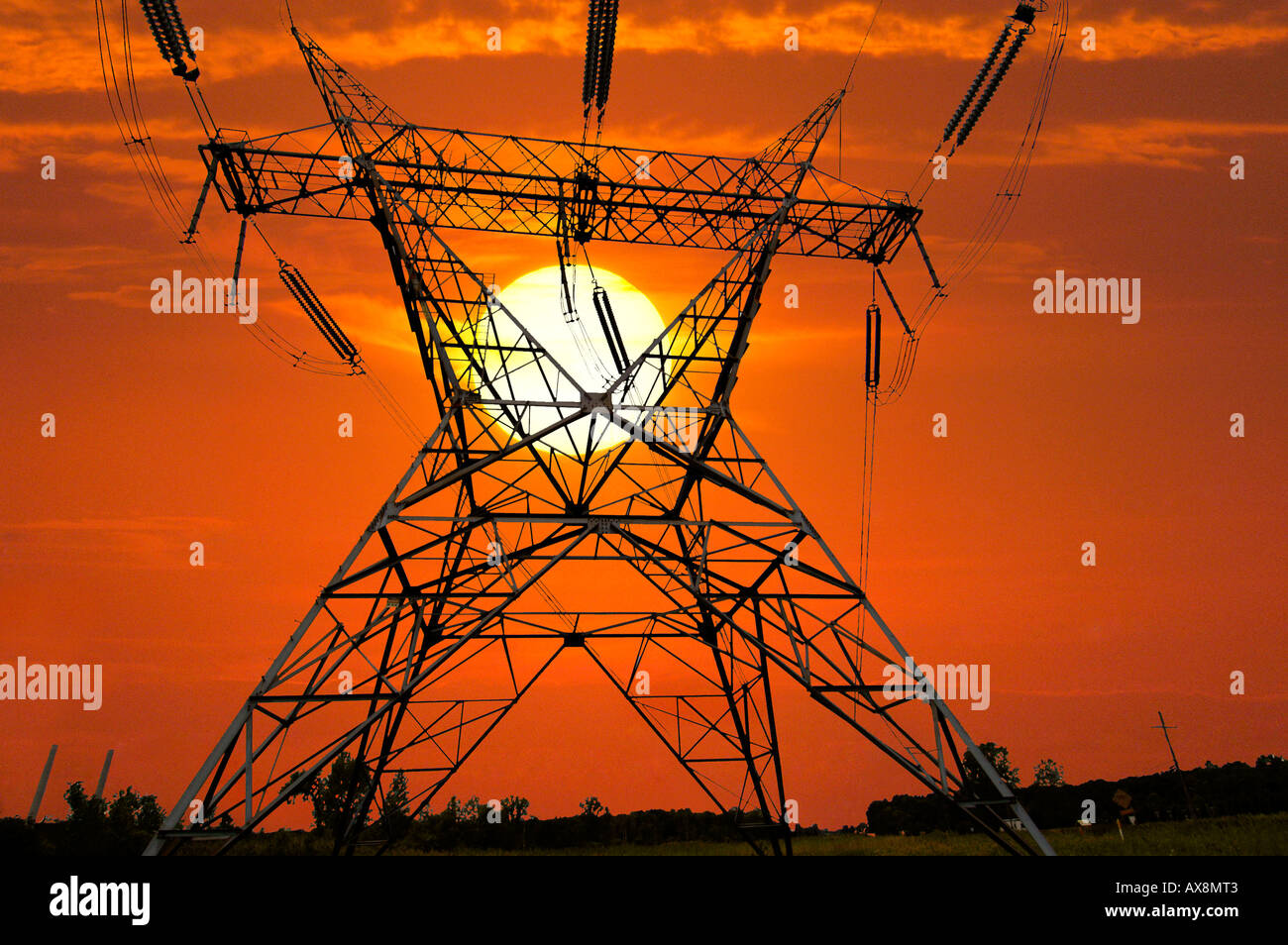 Power lines at sunset Stock Photo - Alamy