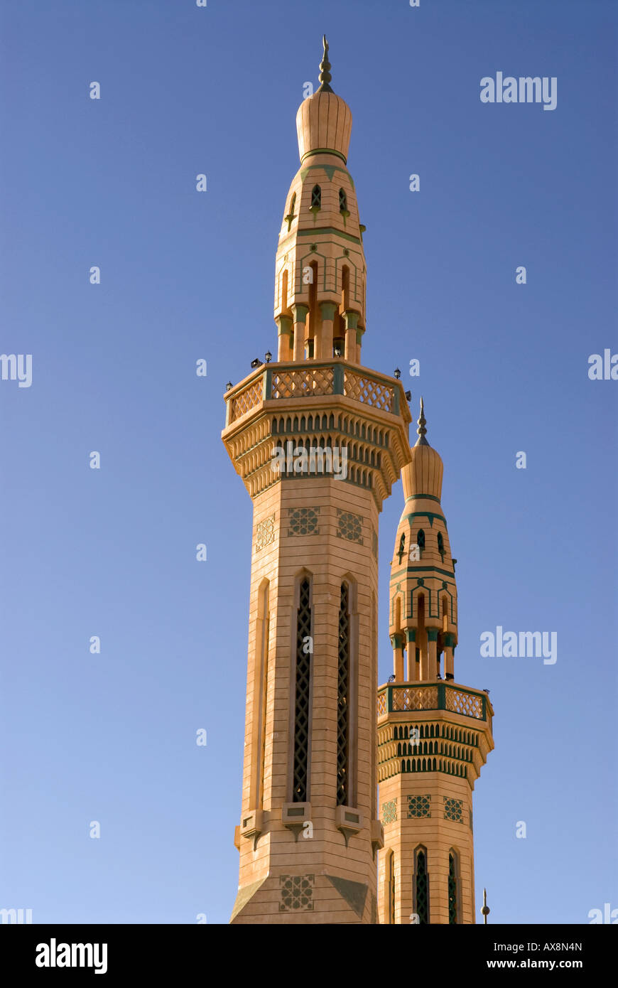 Minarets of the New Mosque in the modern town of Ghadames Libya Stock ...