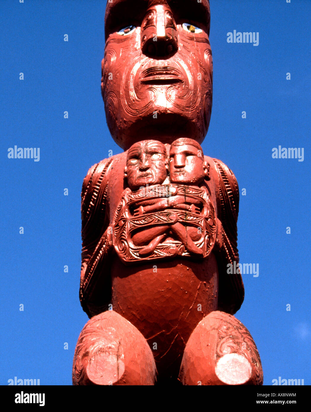 Traditional wood carved Maori figure in New Zealand Stock Photo - Alamy