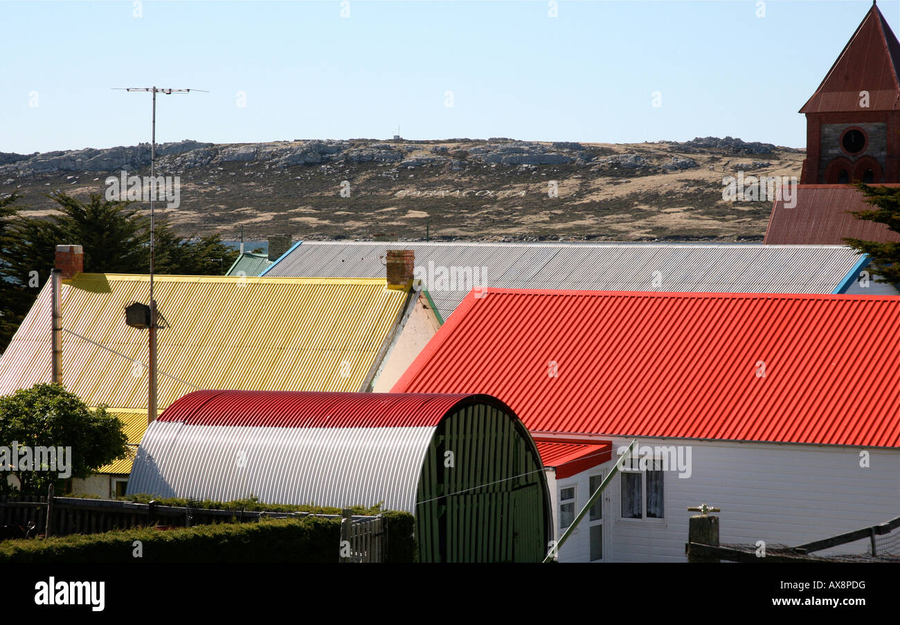colorful roofs in foreground ocean inlet in background Stock Photo - Alamy