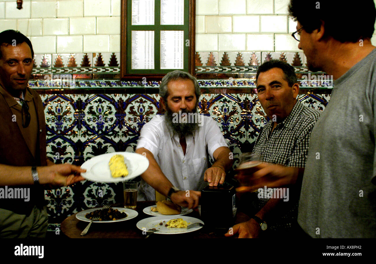 Friends sharing tapas, El Rinconcillo, Seville Andalucia Spain Stock ...