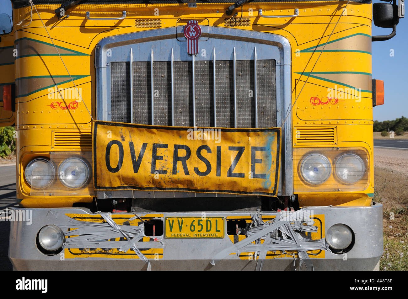 A Kenworth carrying an oversized load, parked next to Port Wakefield ...