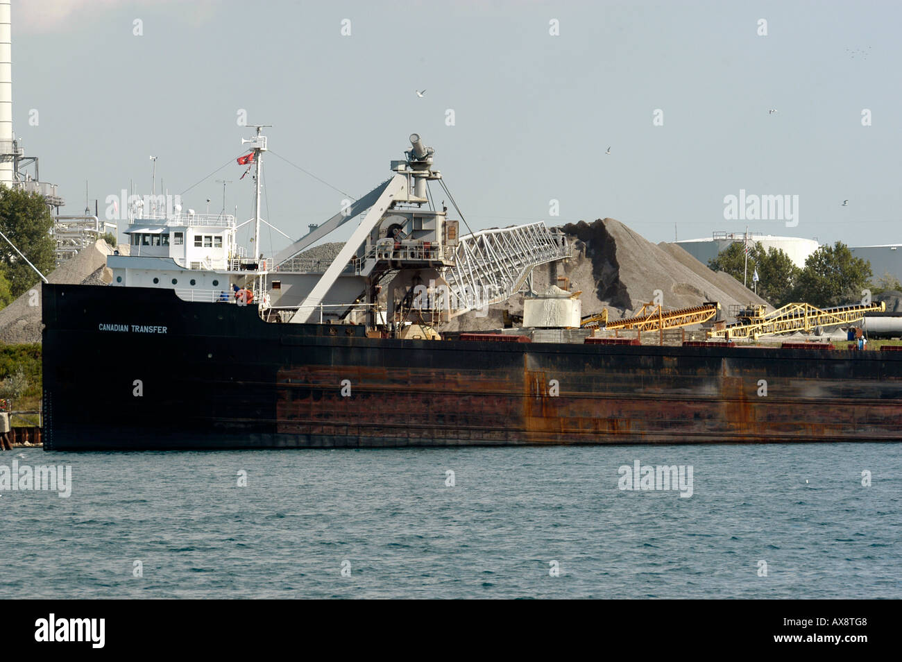 Ship off loads cargo on the Great Lakes at the St Clair River in Port ...