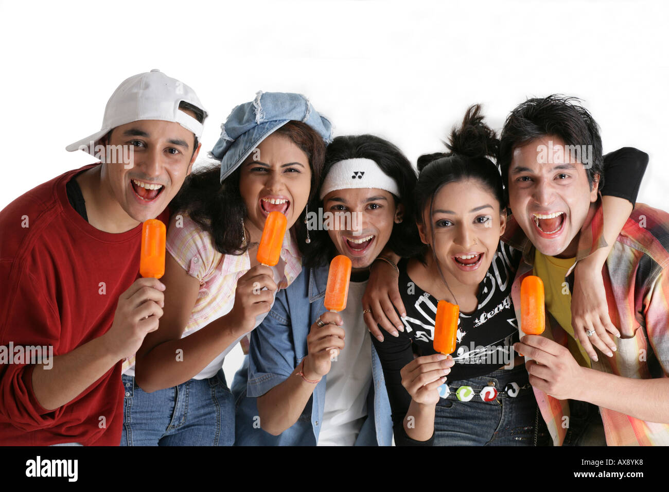 Portrait of teenage friends eating an ice cream Stock Photo - Alamy
