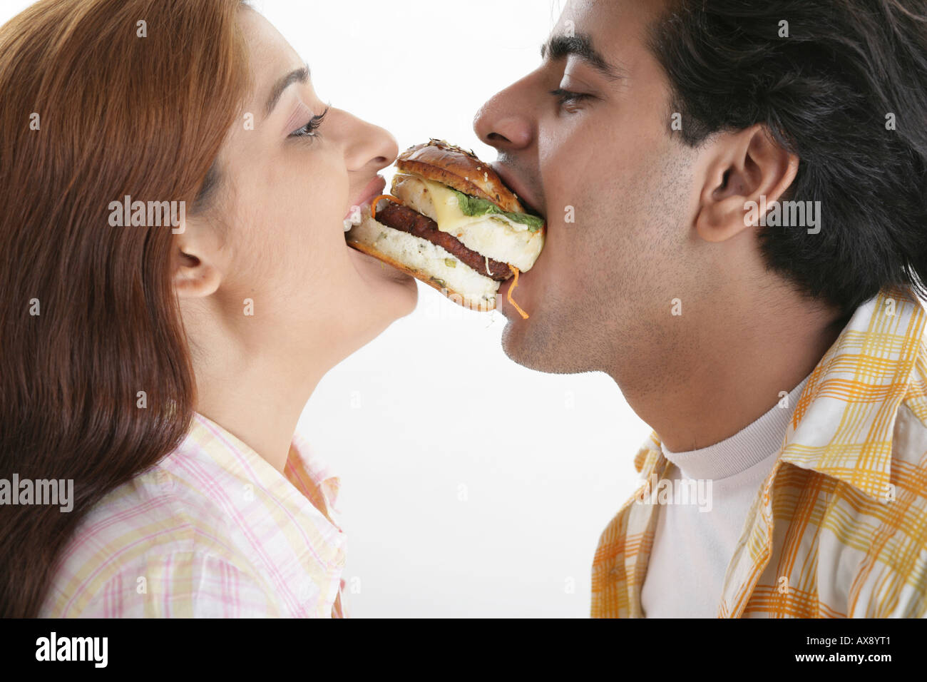 Man eating burger creative hi-res stock photography and images - Alamy