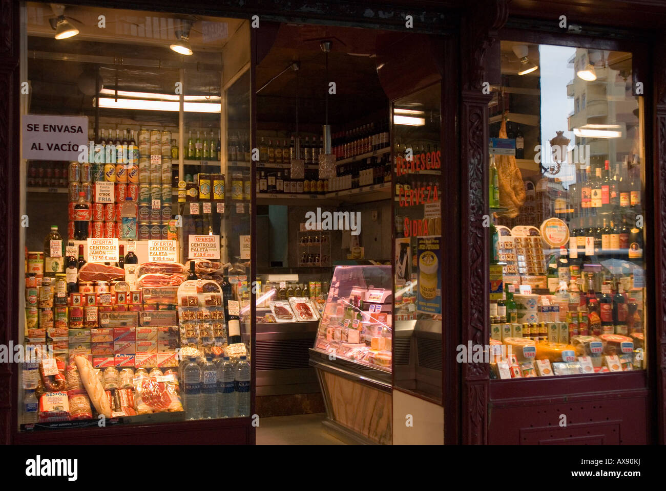 A Spanish food shop window featuring a leg of ham Stock Photo - Alamy