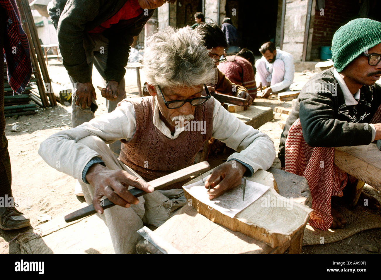 India Rajasthan crafts Sanganer village old craftsman hand cutting ...