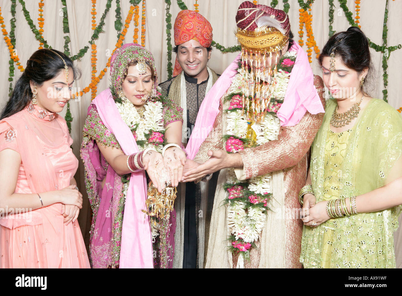 Bride groom getting married with relative standing around them Stock ...