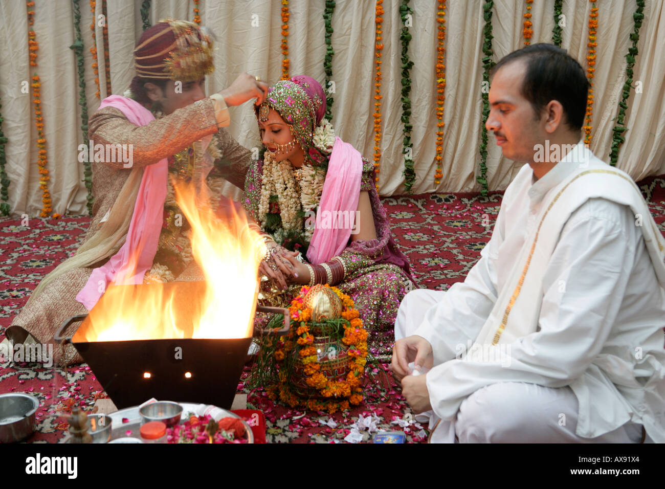 Wedding priest bride and groom hi-res stock photography and images - Alamy