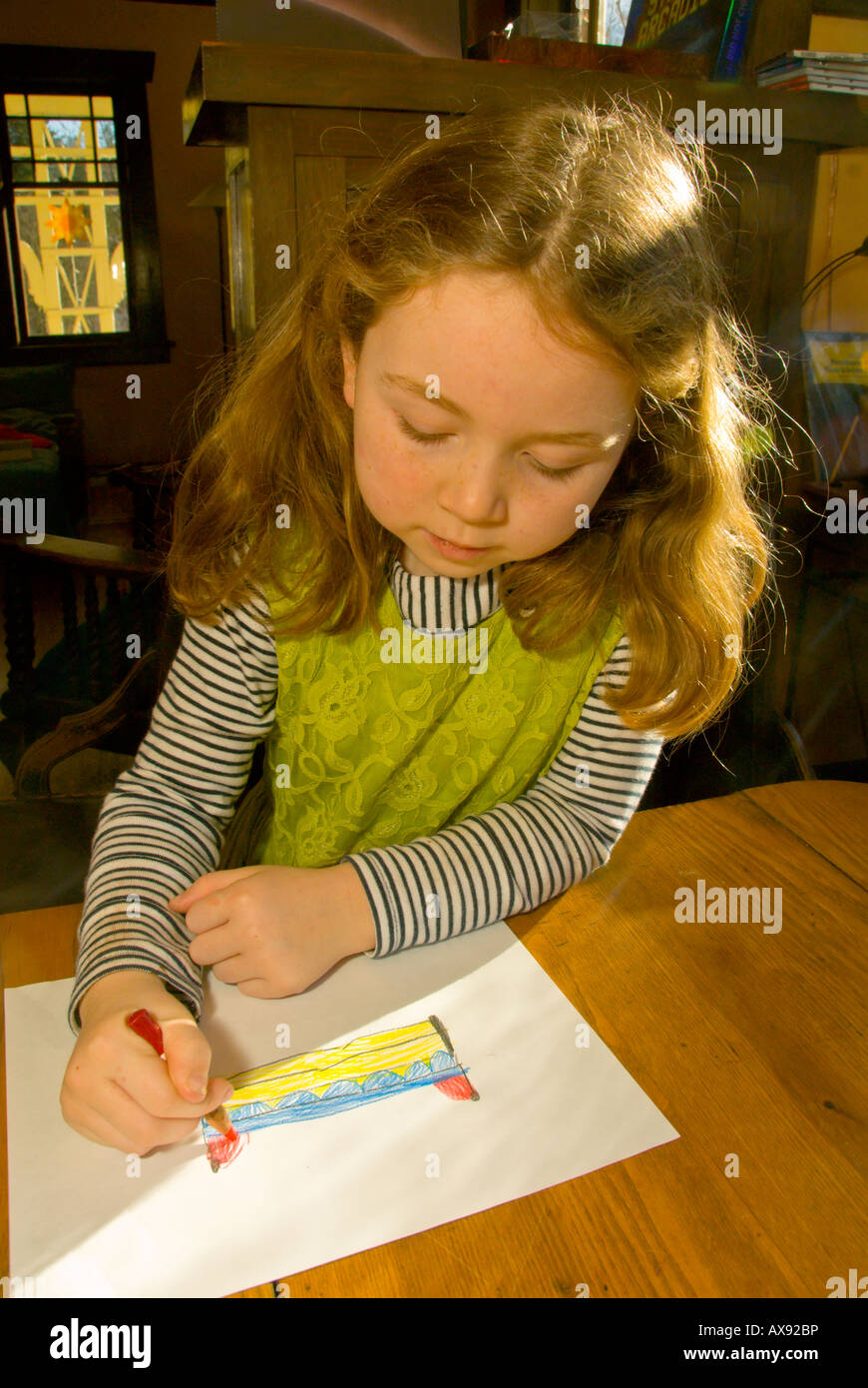 girl drawing picture in home Stock Photo - Alamy