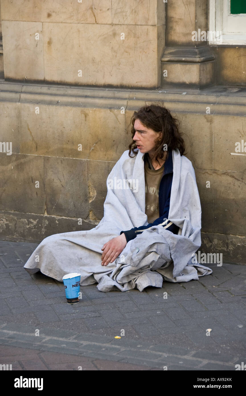 Candid picture of a man begging on a street in Edinburgh, Scotland ...