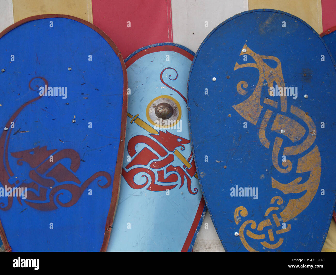 3 blue norman shields leaning tent heraldic sign Stock Photo - Alamy