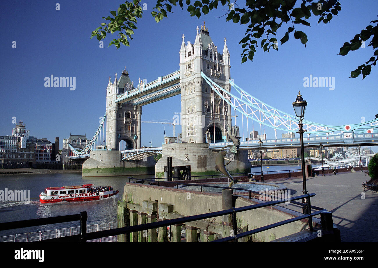 river craft transport passing tower bridge london river thames england ...