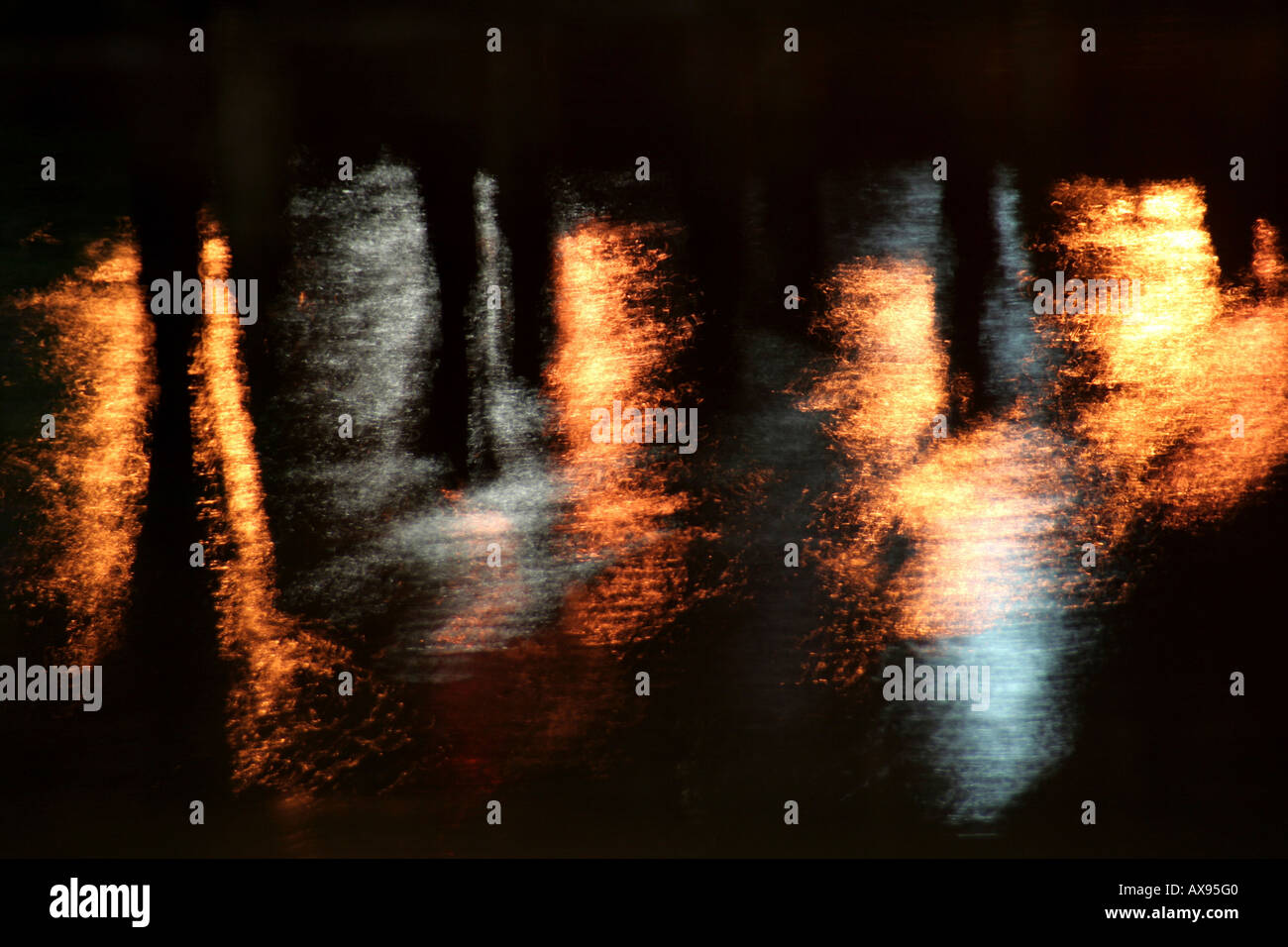 Lights Reflection in water at night Stock Photo - Alamy