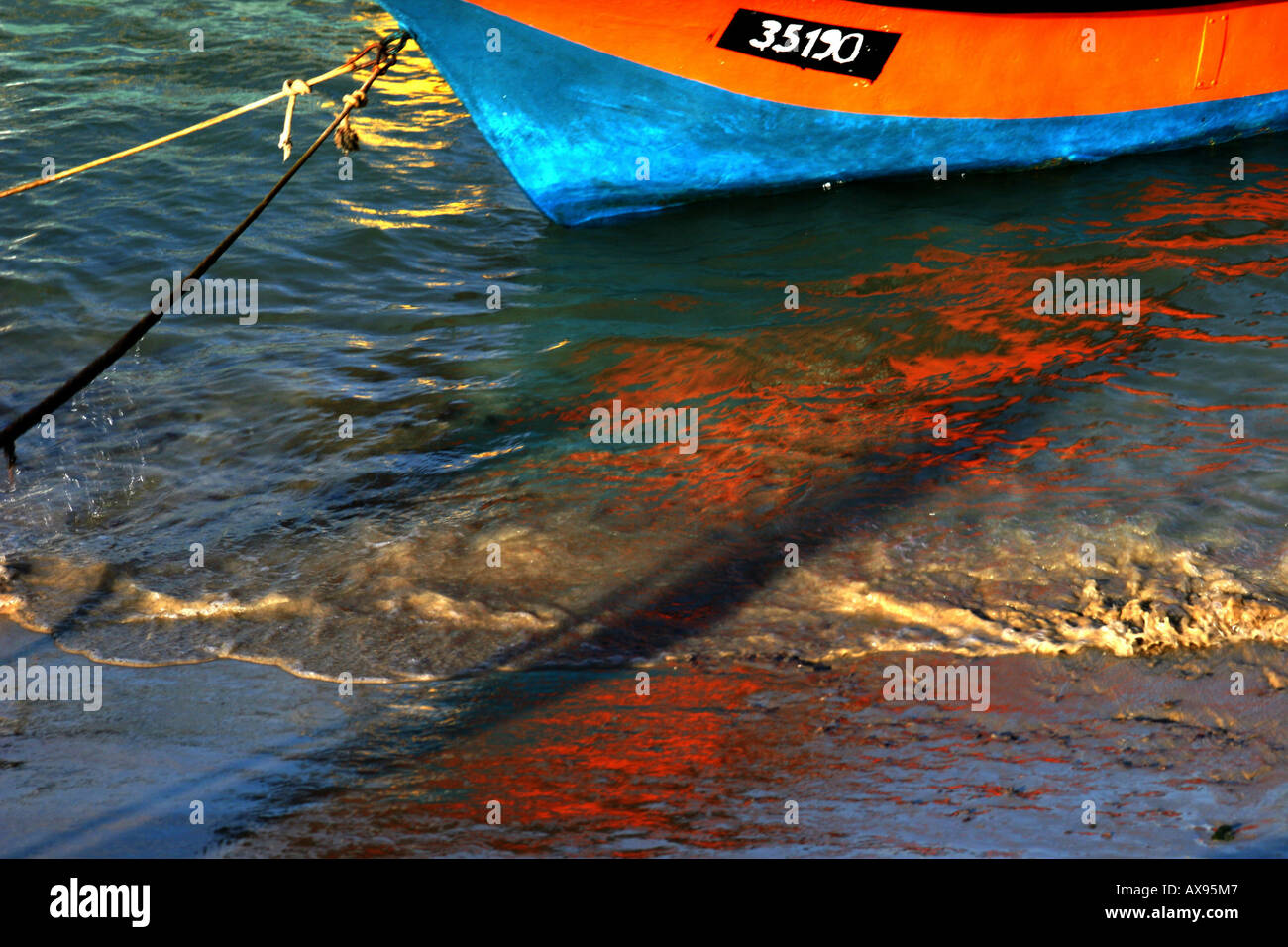 Boats Reflection in water Stock Photo - Alamy