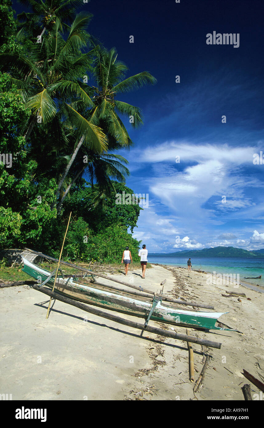 Palm beach with boat, Siladen island, Manado, Sulawesi, Indonesia ...