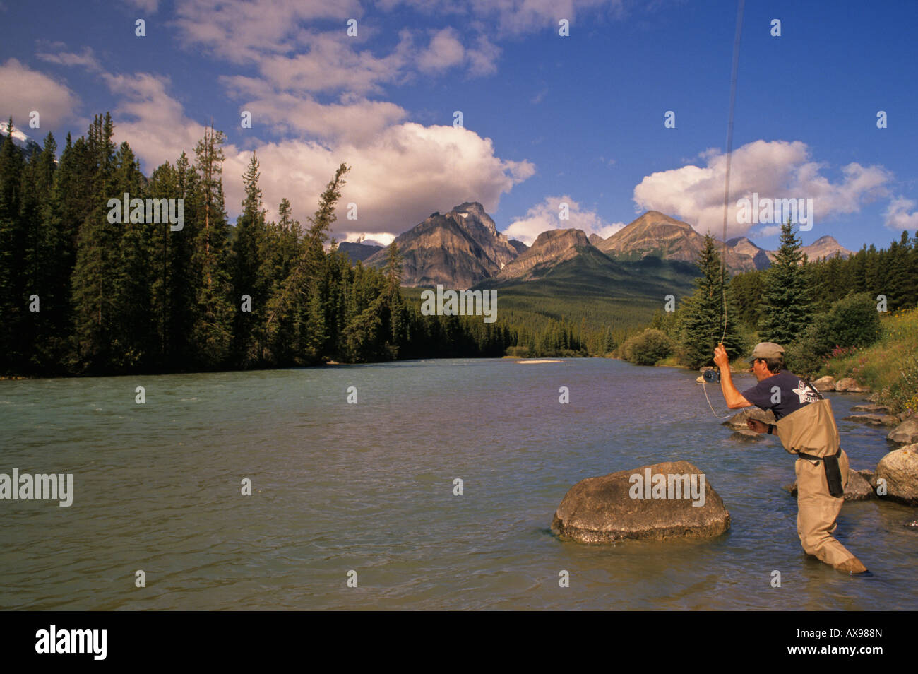 Flyfishing the Bow River Banff National Park Alberta Stock Photo - Alamy
